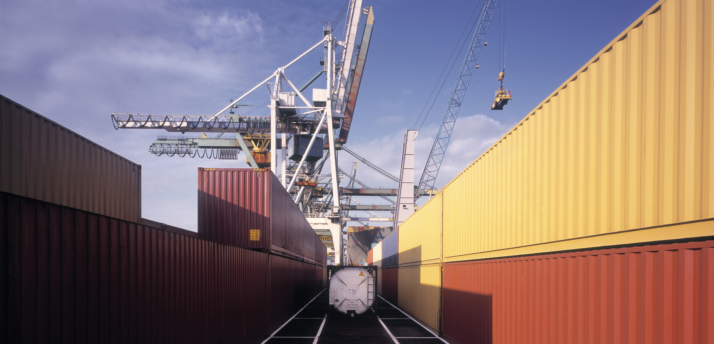 Container terminal at dawn • Bestway International